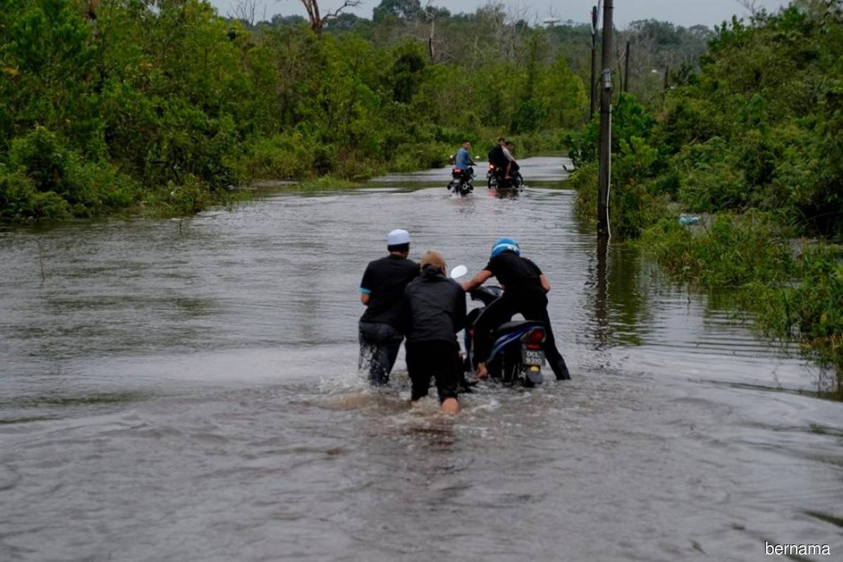 Number of flood victims in Pahang, Kelantan and Perak drops but climbs ...