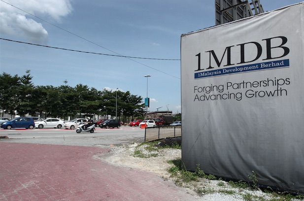 1MDB makes payment on dollar bonds, price slumps to record low