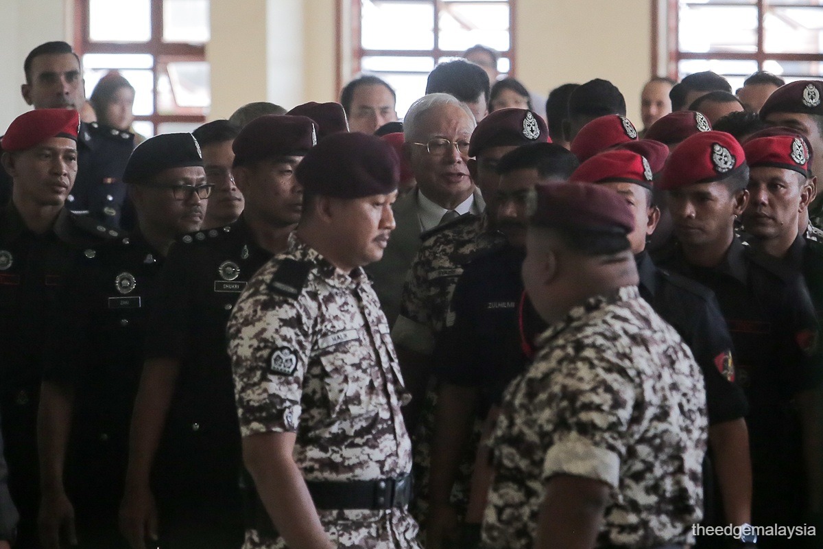 Malaysia's activists renew reform calls after ex-PM Najib jailed for ...