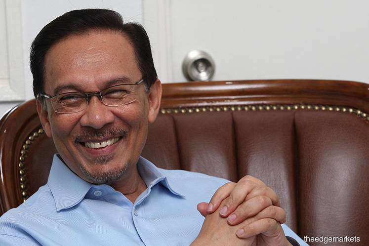 Anwar Ibrahim: Staying out for now to give Mahathir 'free hand'
