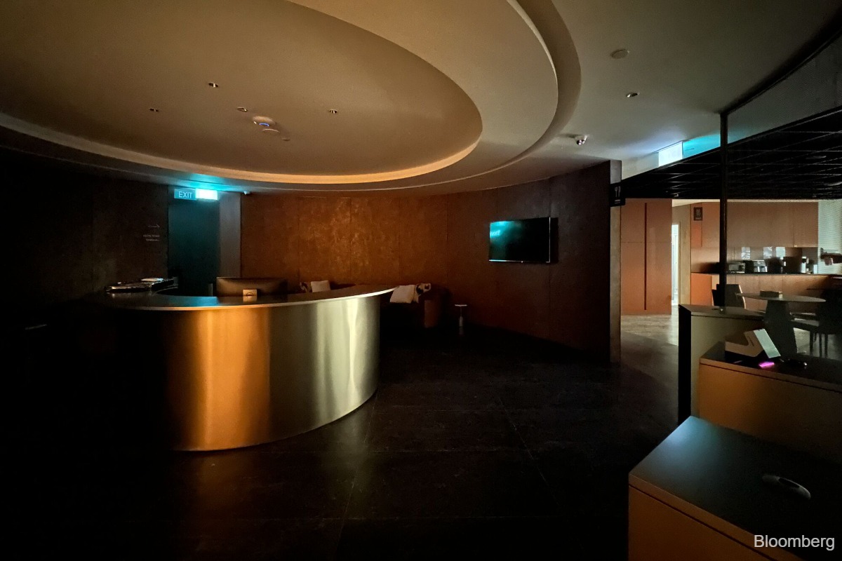 Alleged scam leader’s Singapore aide seeks access to seized cash