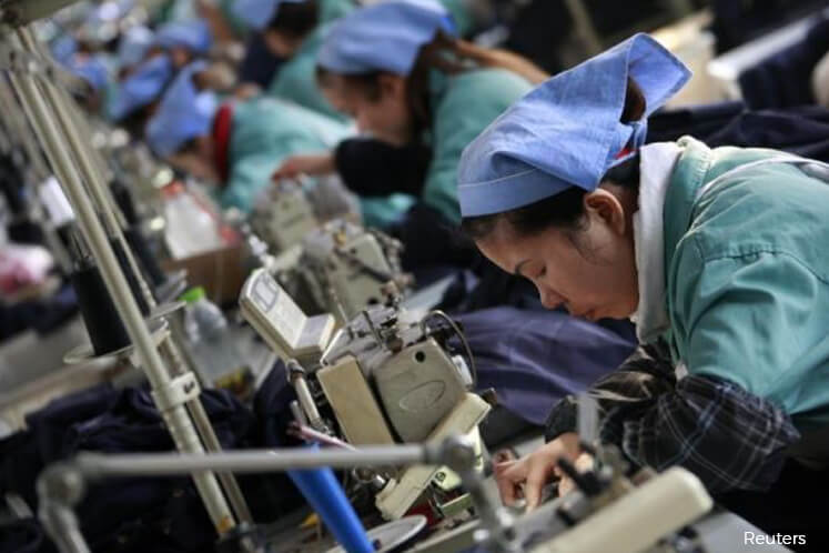 China May industrial output up 5.0%, below forecasts, weakest in 17 years