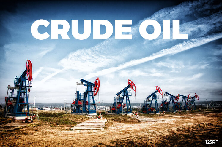 Oil prices edge up as drop in U.S. crude stocks eases glut worries