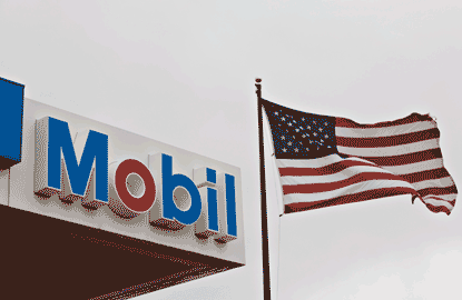 Exxon Mobil loses top credit rating it held since depression