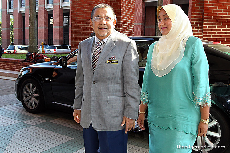 Isa, wife arrive at MACC Putrajaya to give statements