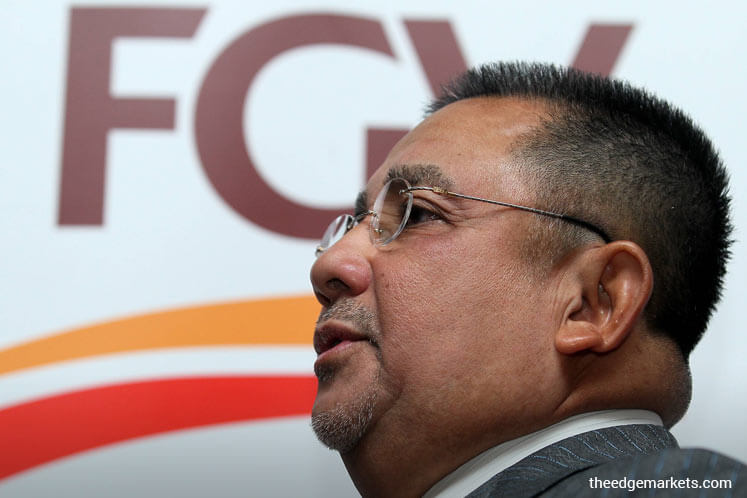 Isa携妻抵反贪会布城总部录供