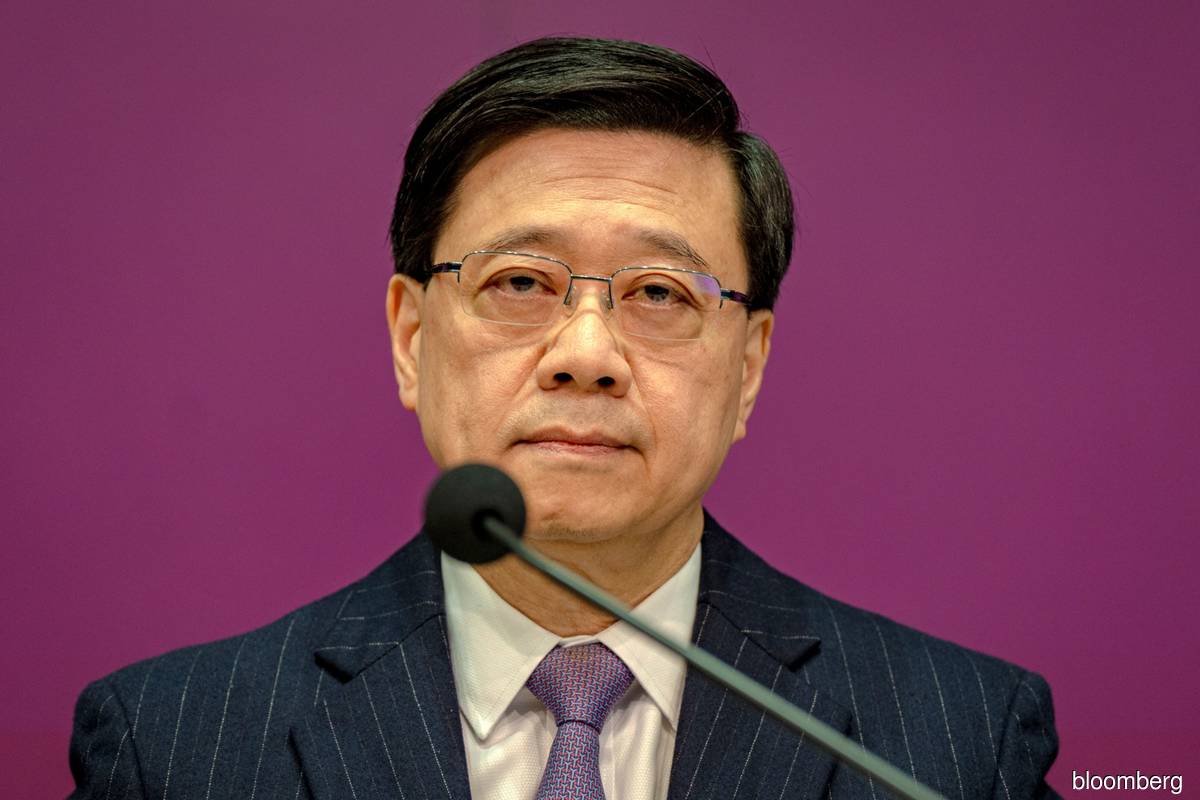 Hong Kong's leader says to maintain US dollar peg, despite geopolitical ...