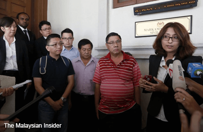 Two years on, MH370 families say search for missing jet must continue