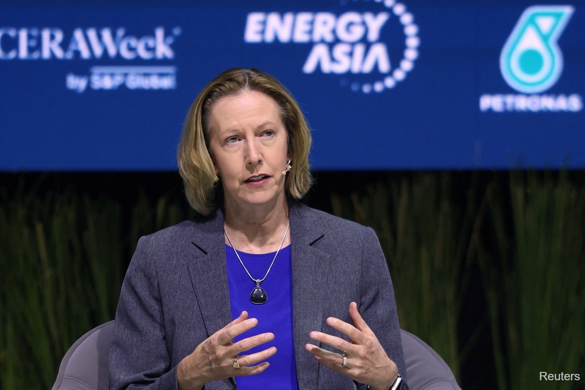 Australia's Woodside Energy signs 15-year LNG supply deal with Petronas ...