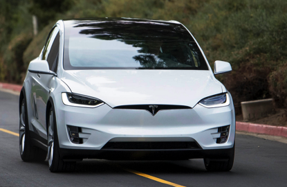 Elon Musk delivers Tesla's first Model X SUVs in California