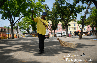 Dirty, unglamorous work, but Malaysians are doing it