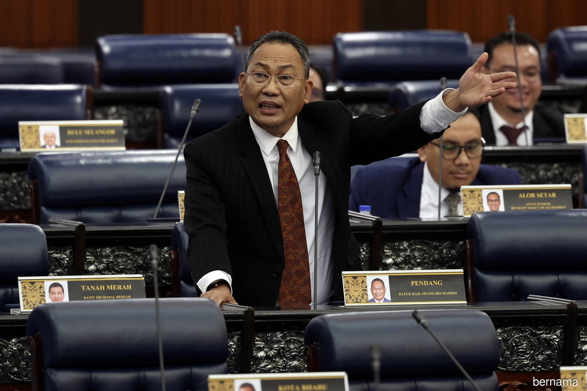 Pendang MP told to produce evidence, apologise over RM94 mil found in ...