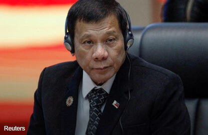 Wary of China, Duterte tells navy to build 'structures' east of Philippines