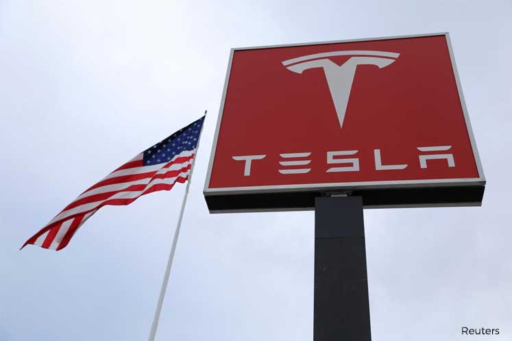 Tesla fired hundreds of employees in past week