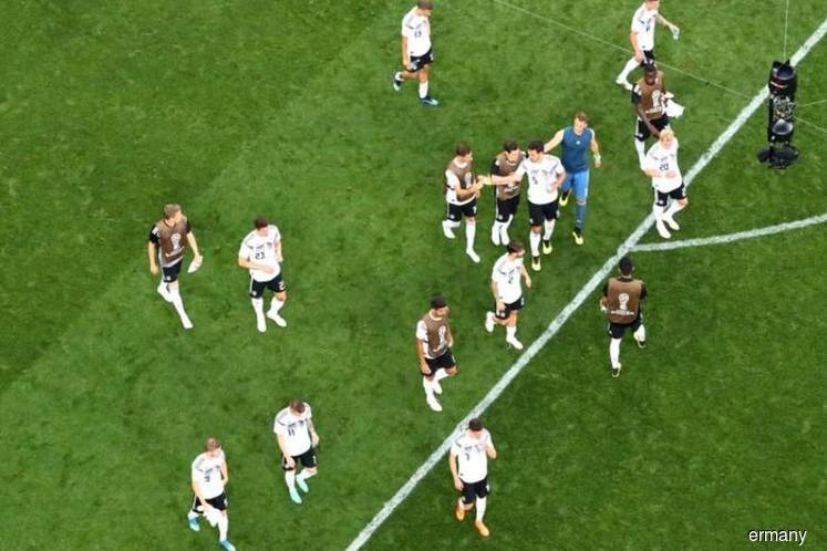 Stunned Germany pledge to bounce back from Mexico loss