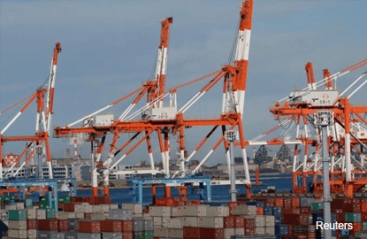 Japan exports up for first time in 15 months, US protectionism poses risks