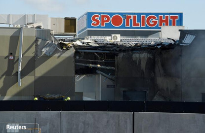 Five die as light plane crashes into mall in Australia