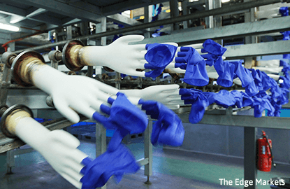 Top Glove, Kossan in spotlight on stronger ringgit, raw material prices