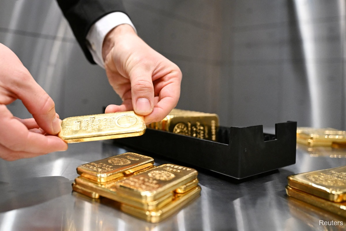 Gold hits record high on bets of further Fed rate cuts ahead of Powell ...