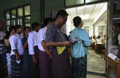 Myanmar voters head to polls in landmark vote 25 years in making