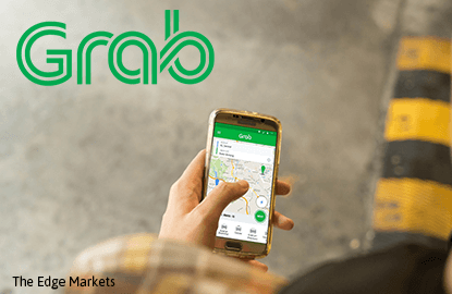 Grab launches coach service in Singapore