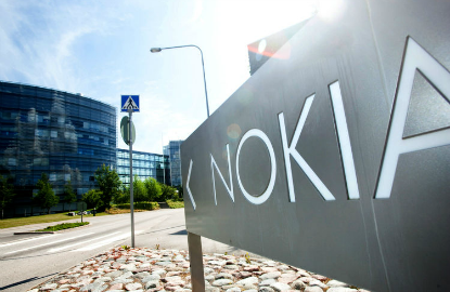 Nokia posts falling network sales, lifts cost-saving targets