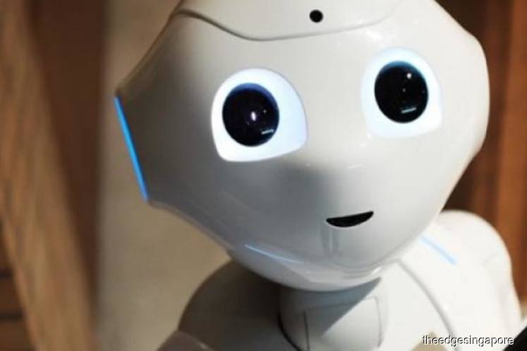 UOB welcomes new robot staff Amy and Eve to its workforce