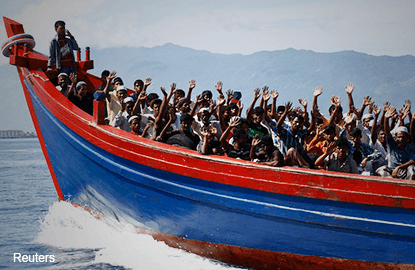 Aid ship to help Rohingyas arrives in Myanmar, greeted by protest