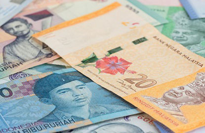 Asian currencies continue to slide; ringgit, rupiah most vulnerable
