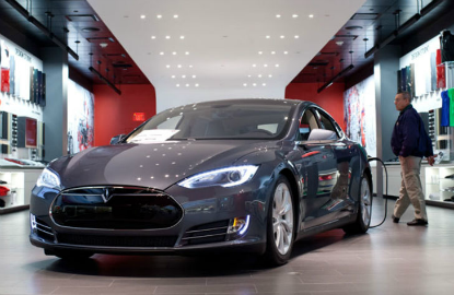 Tesla accelerates to hit target of 500,000 cars yearly