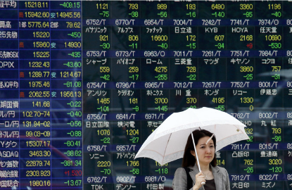 Tokyo stocks close higher after sales tax delay report