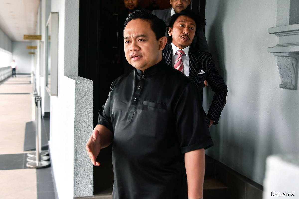 Wan Saiful’s 18 money-laundering charges to be tried together with ...
