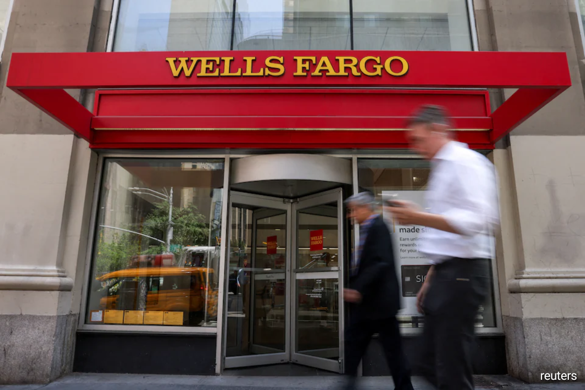 China says Wells Fargo banker under exit ban involved in criminal case